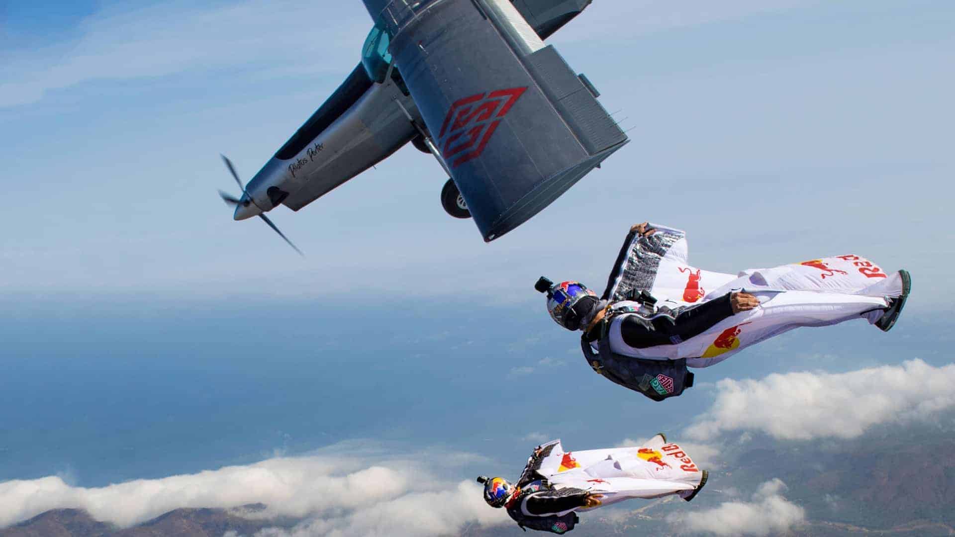 Mind-Blowing Stunt: Wingsuit BASE Jump Into a Plane Mid-Air! | TEEM